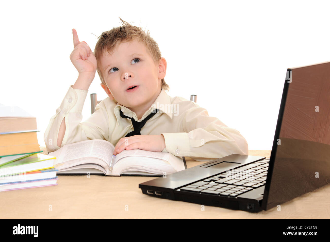 boy pupil thinks for in time homework Stock Photo - Alamy