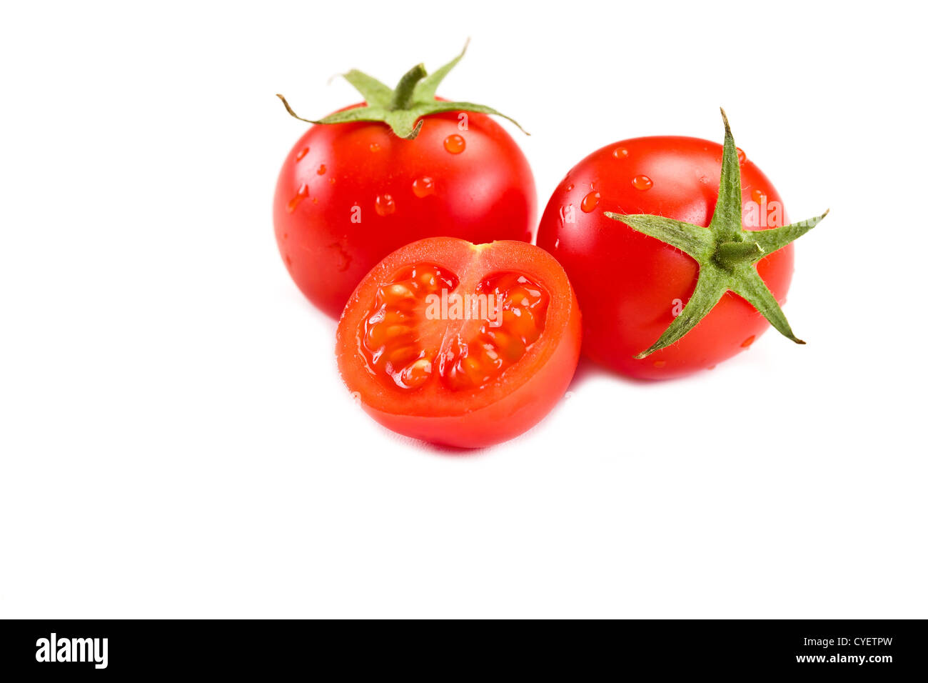 photo of very fresh tomatoes presented on white background Stock Photo ...