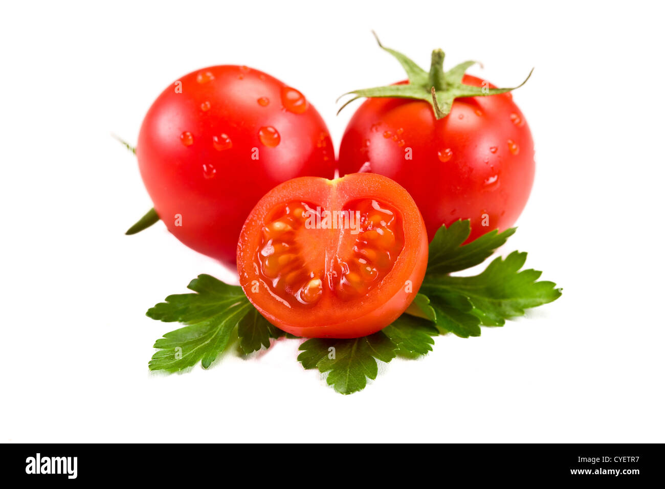 photo of very fresh tomatoes presented on white background Stock Photo ...