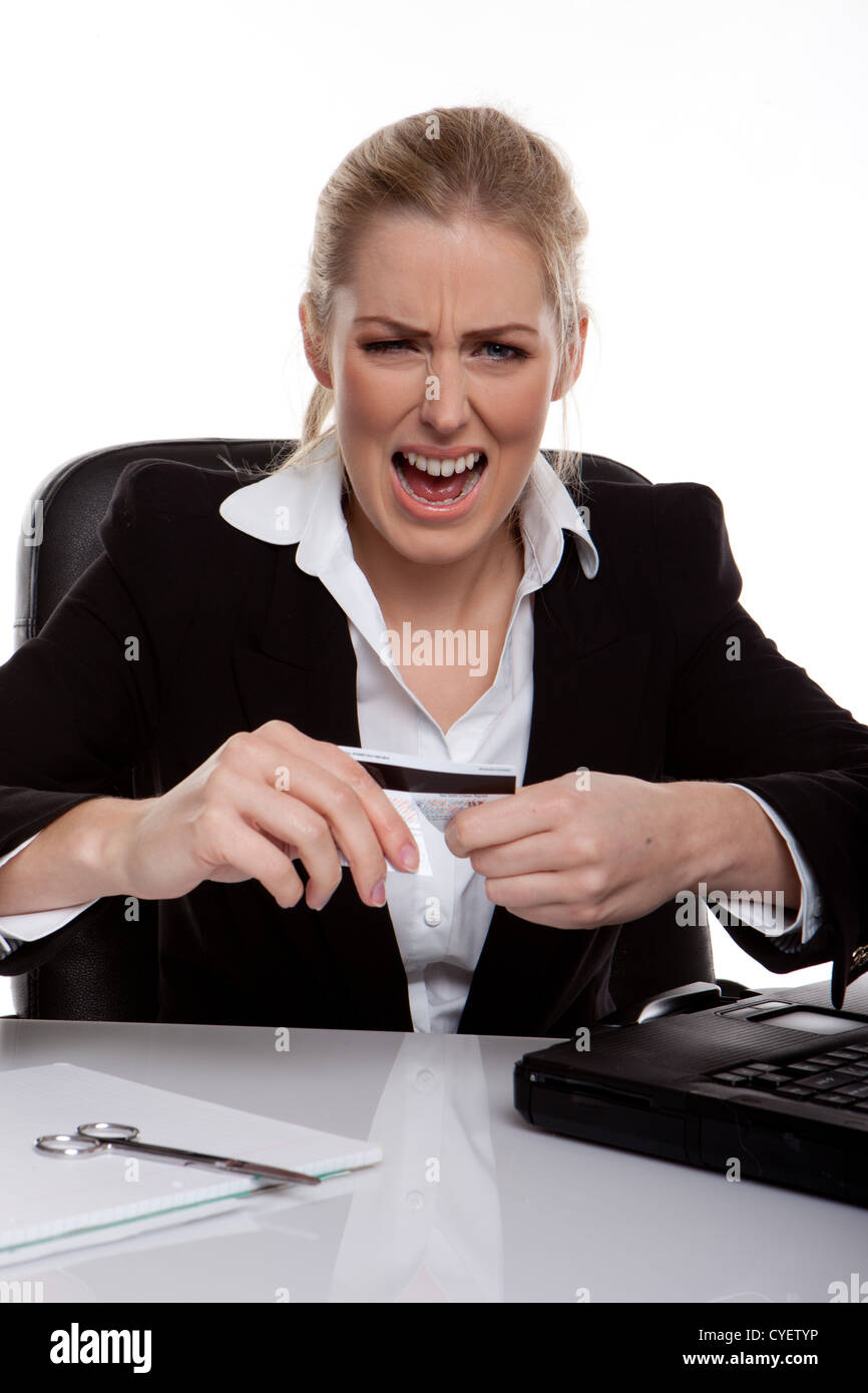 Businesswoman Throwing A Tantrum holding her credit card in her hands ...