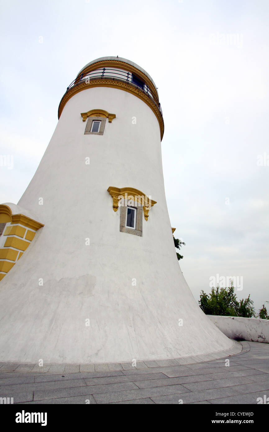 The Guia Fortress white tower in Macau Stock Photo - Alamy