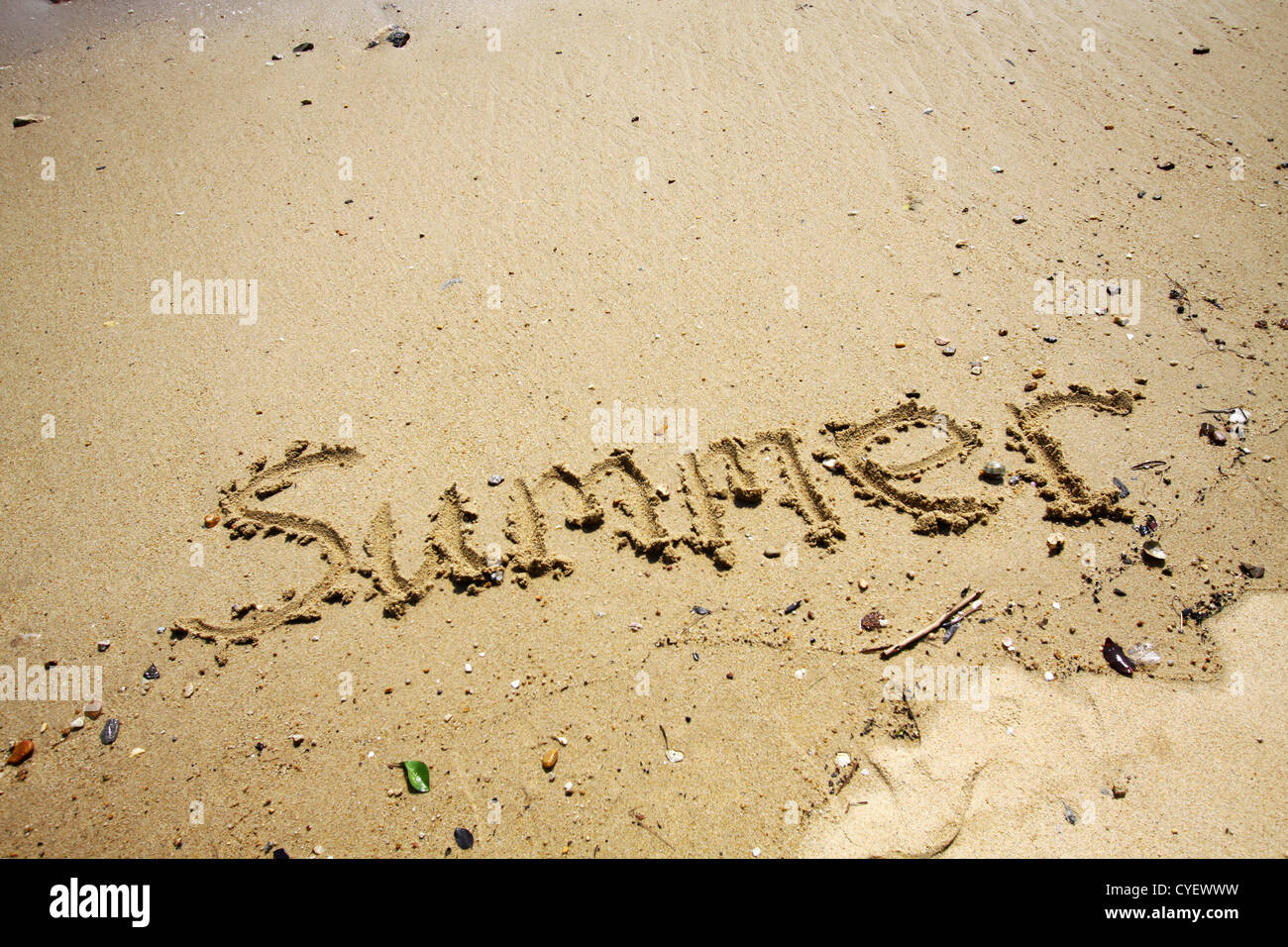 Summer words on sand Stock Photo - Alamy