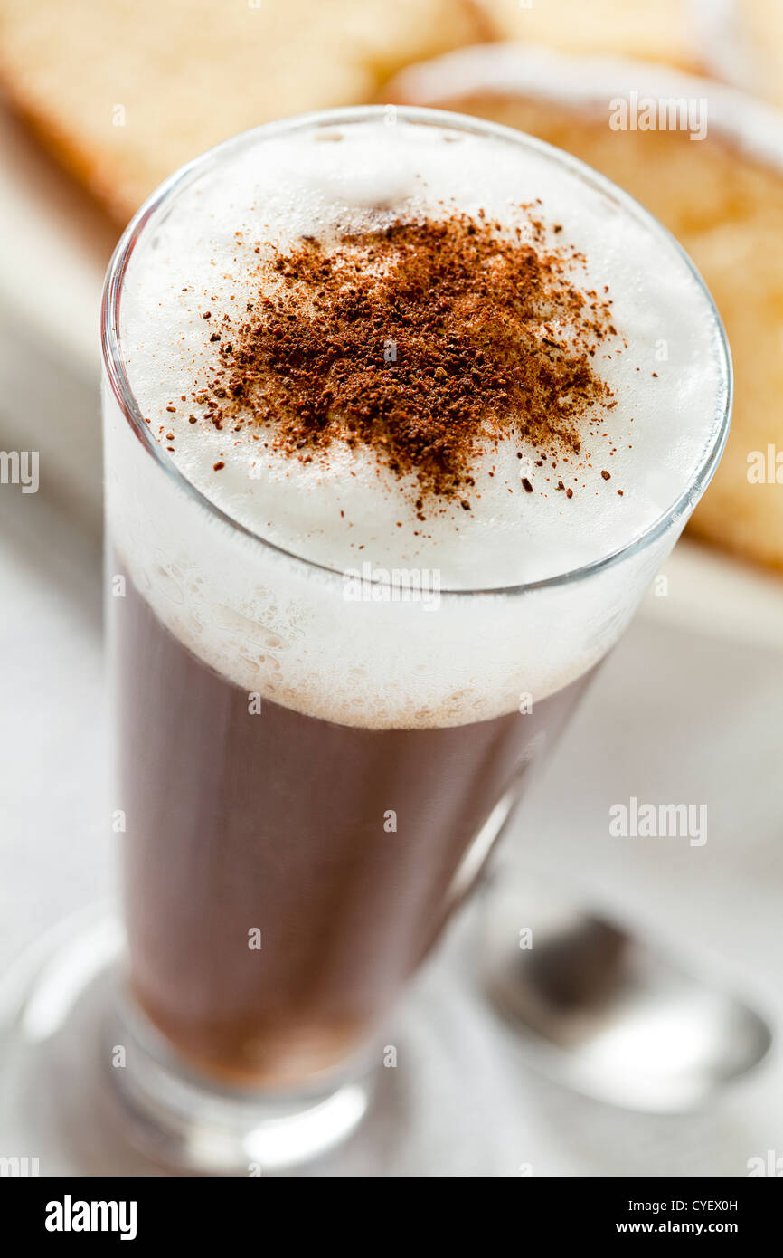 Photograph of a long glass of hot coffee Stock Photo - Alamy