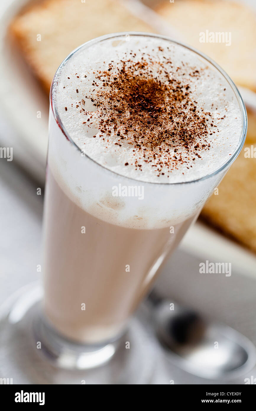 Photograph of a long glass of hot coffee Stock Photo - Alamy