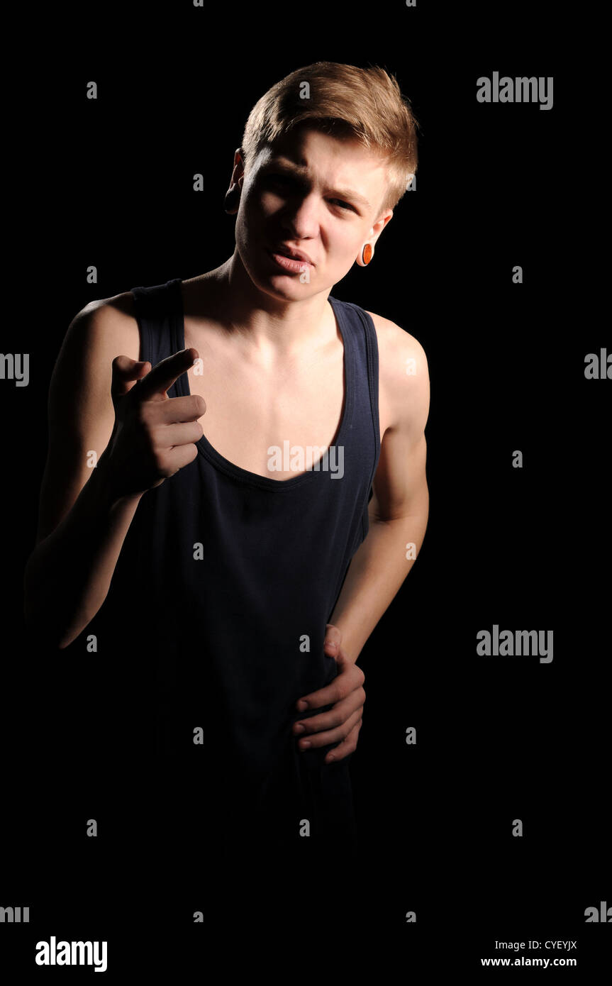 portrait of a teenager on darken background Stock Photo - Alamy
