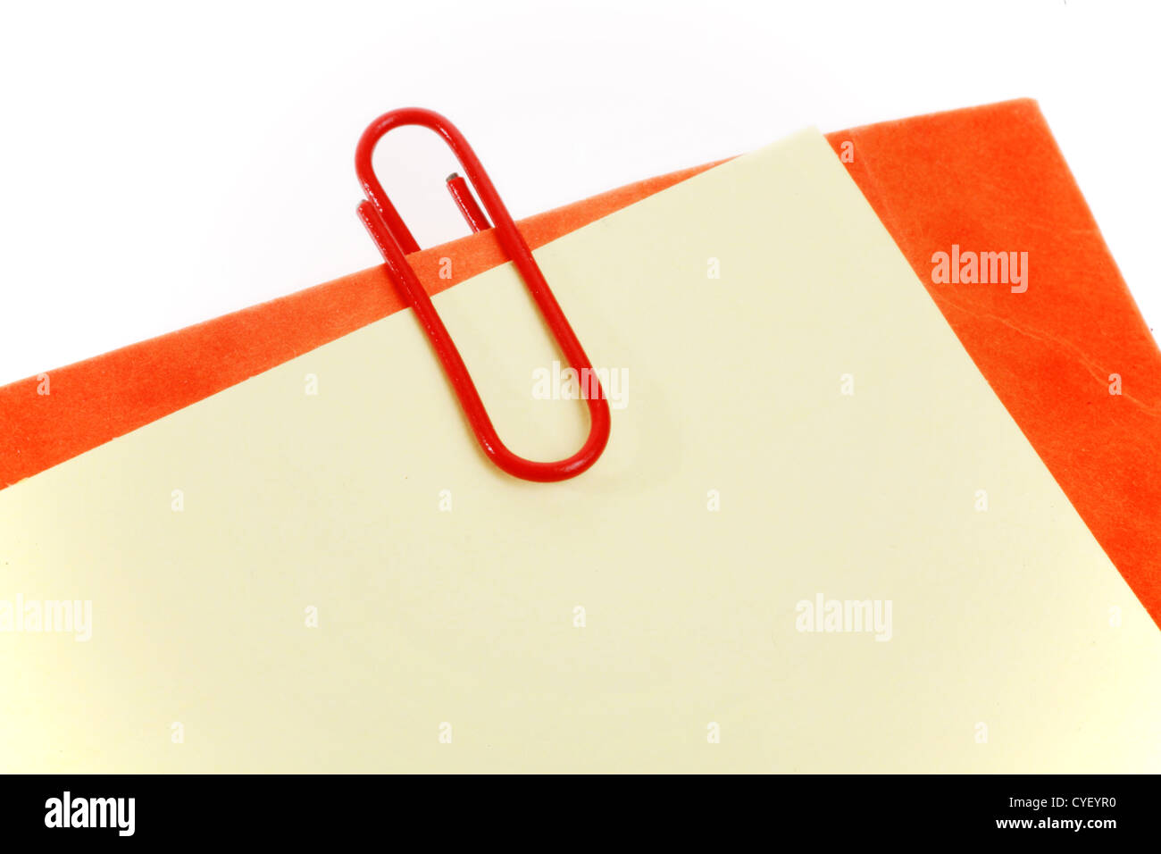 Paper clip holding blank post it hi-res stock photography and images ...