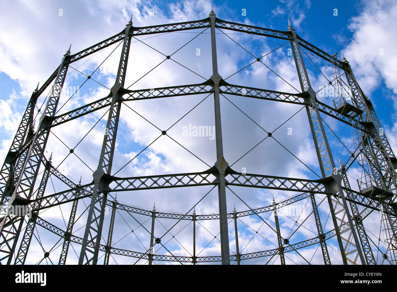 Round metal construction over cloudy sky background Stock Photo - Alamy