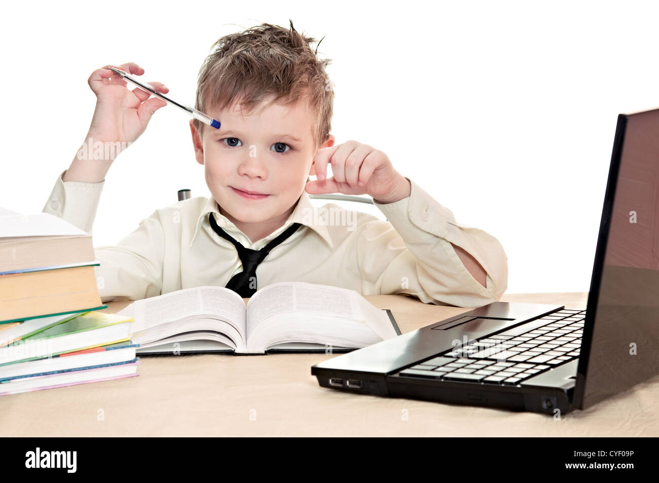 boy pupil thinks for in time homework Stock Photo - Alamy