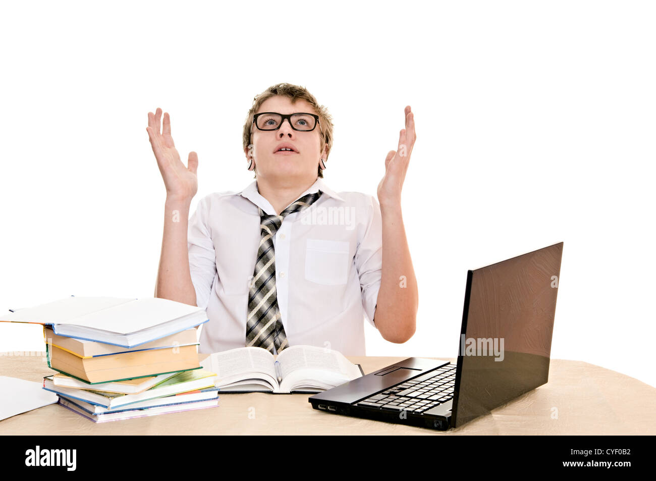 teenager student sits behind a desk isolated on white background Stock ... teenager student sits behind a desk isolated on white background Stock ...