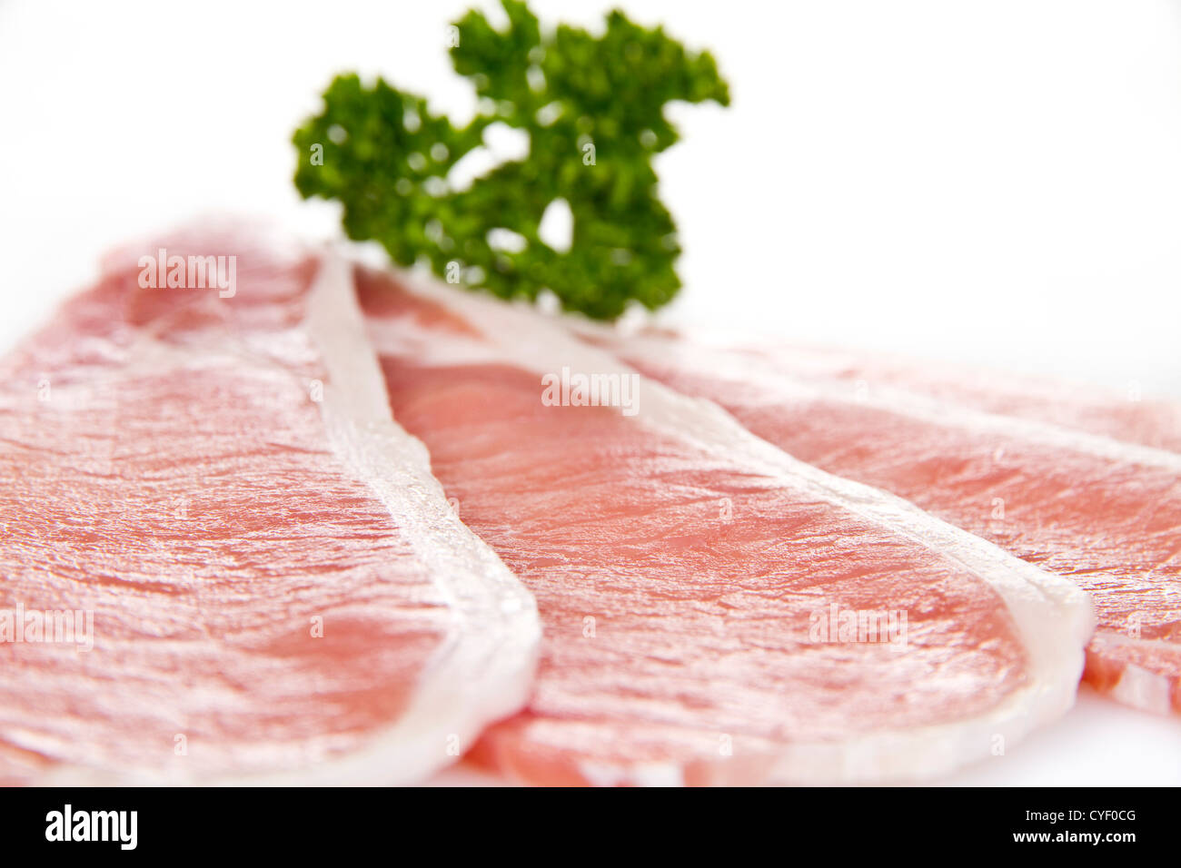 Sliced bacon isolated over white background Stock Photo - Alamy
