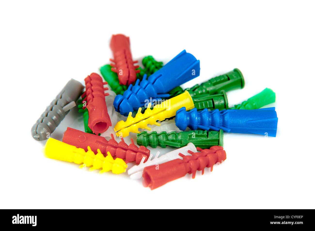 Isolated colorful wall plugs on white background Stock Photo - Alamy