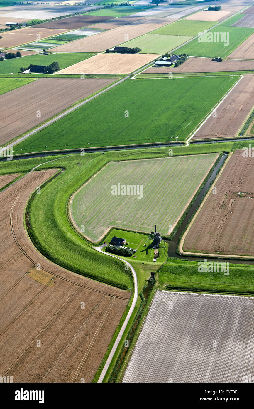 The Netherlands, Eemsmond, Farms and farmland. Traditional windmill ...