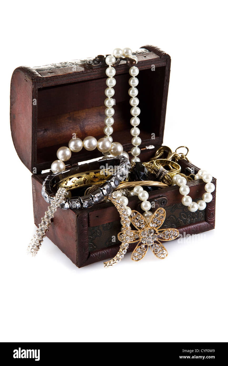 Treasure Chest full of jewelery isolated over white background Stock ...