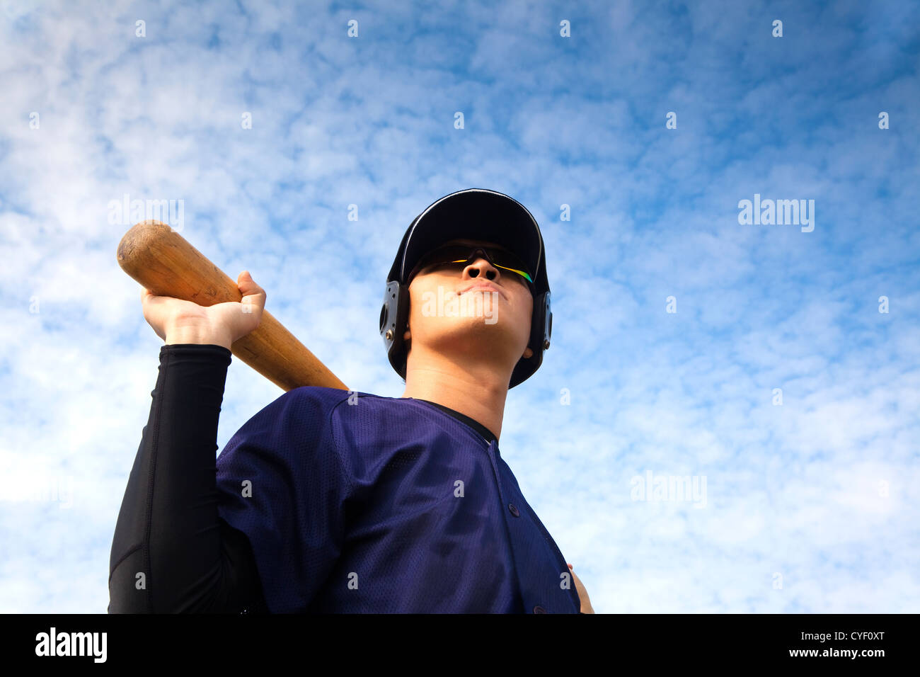 young baseball player with bat Stock Photo - Alamy
