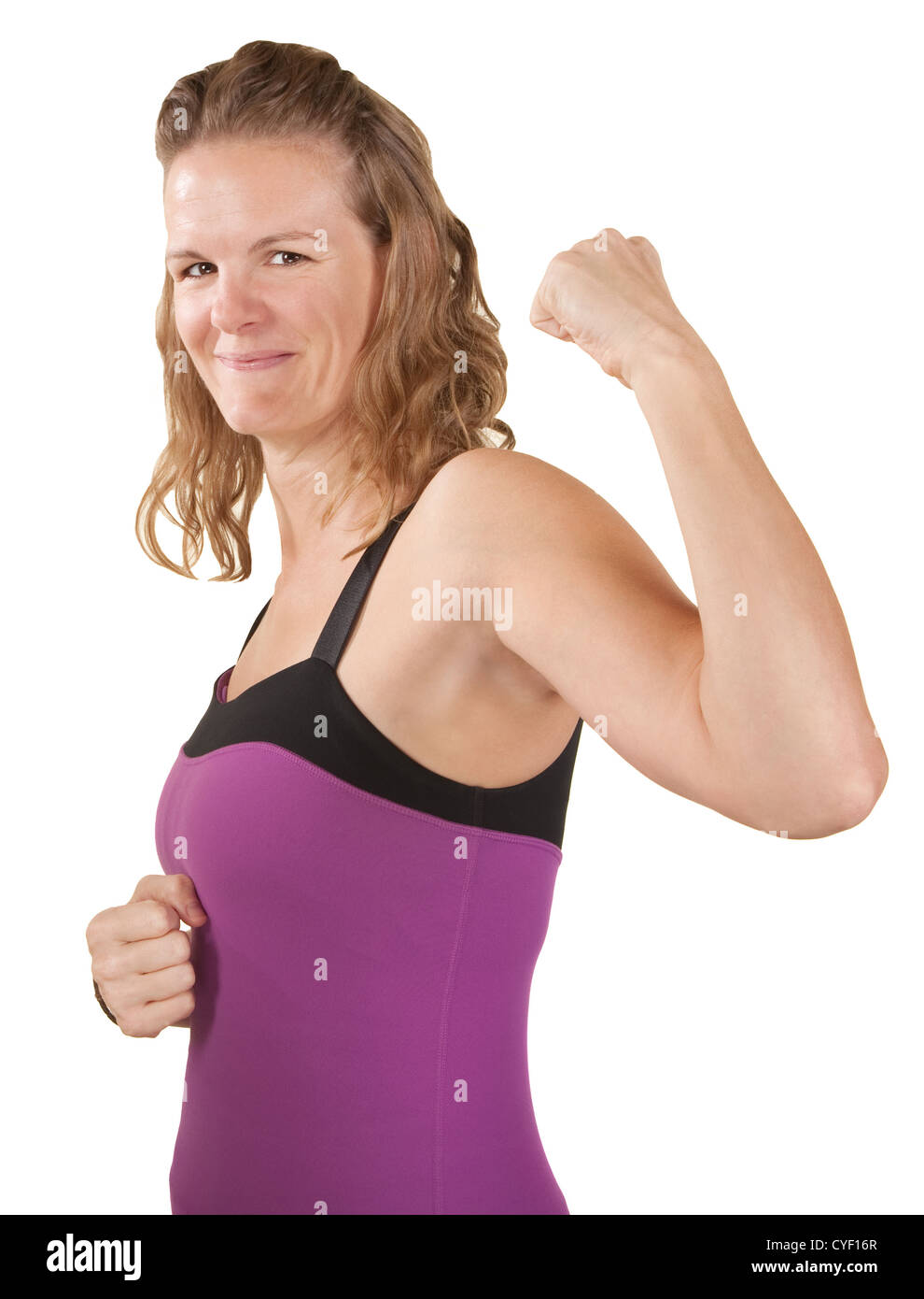 Fit young woman over white shows off biceps Stock Photo - Alamy