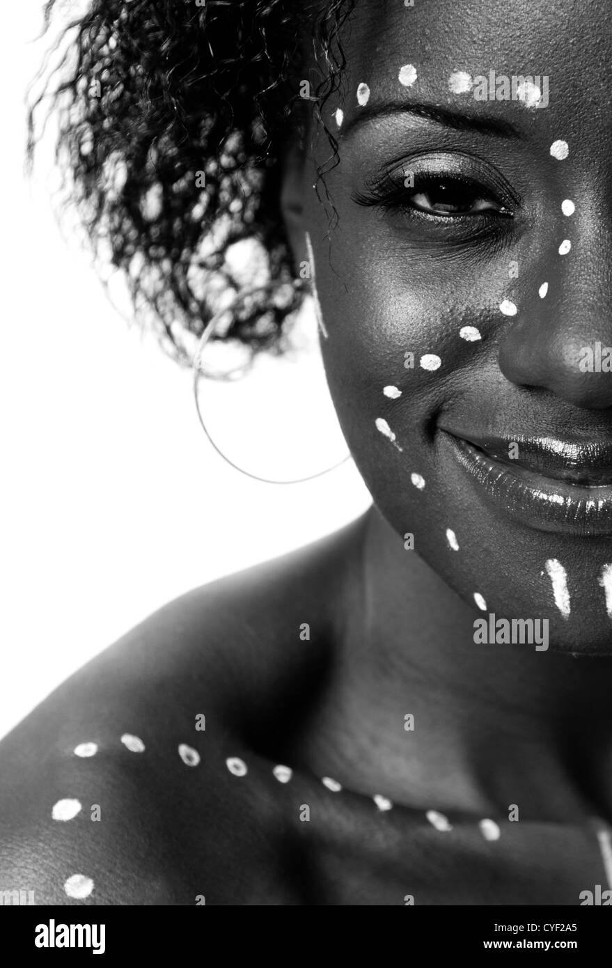 Half face of Happy smiling beautiful indigenous African tribal woman ...