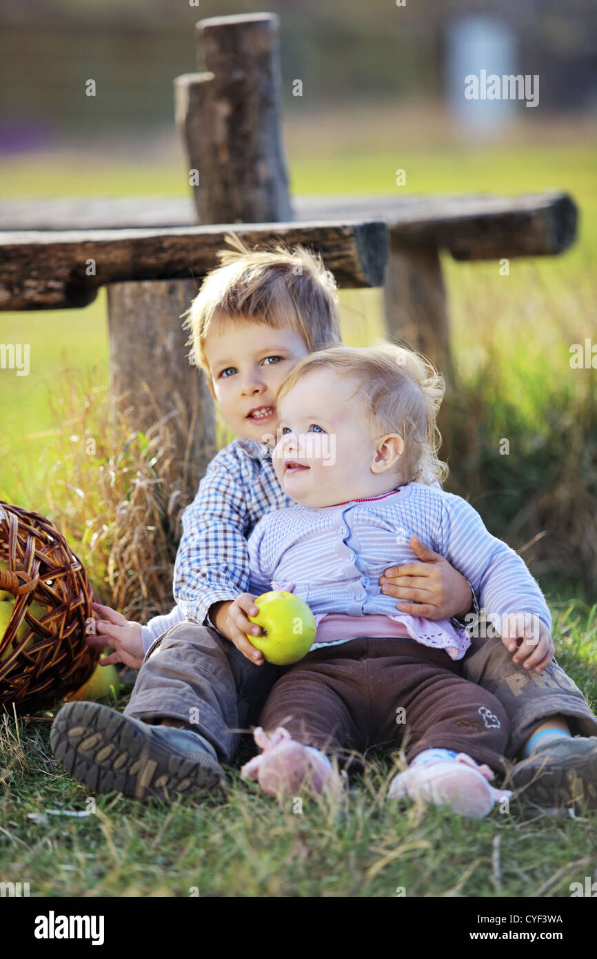 Cute kids having fun at countryside Stock Photo - Alamy