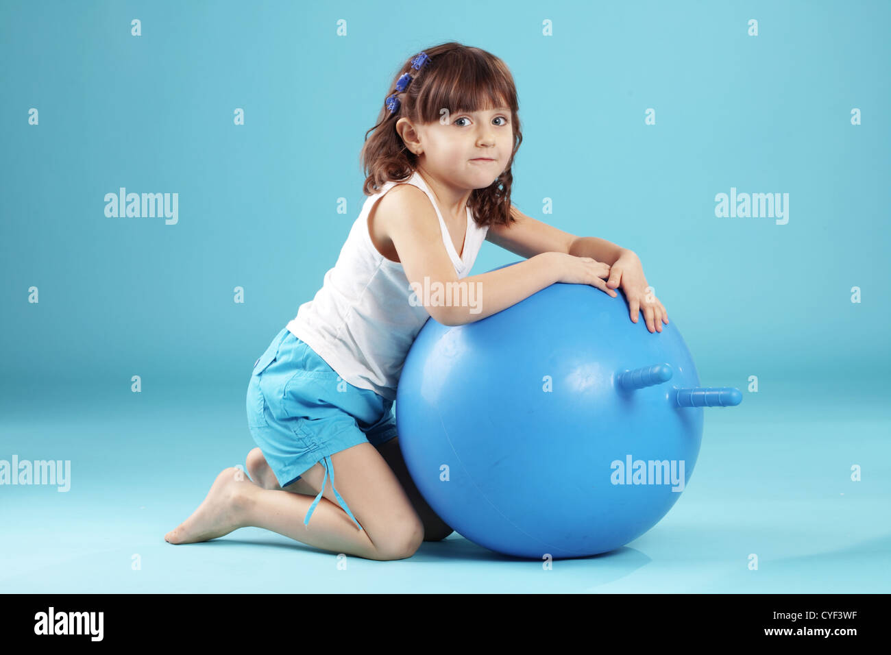 Child with gymnastic ball Stock Photo - Alamy