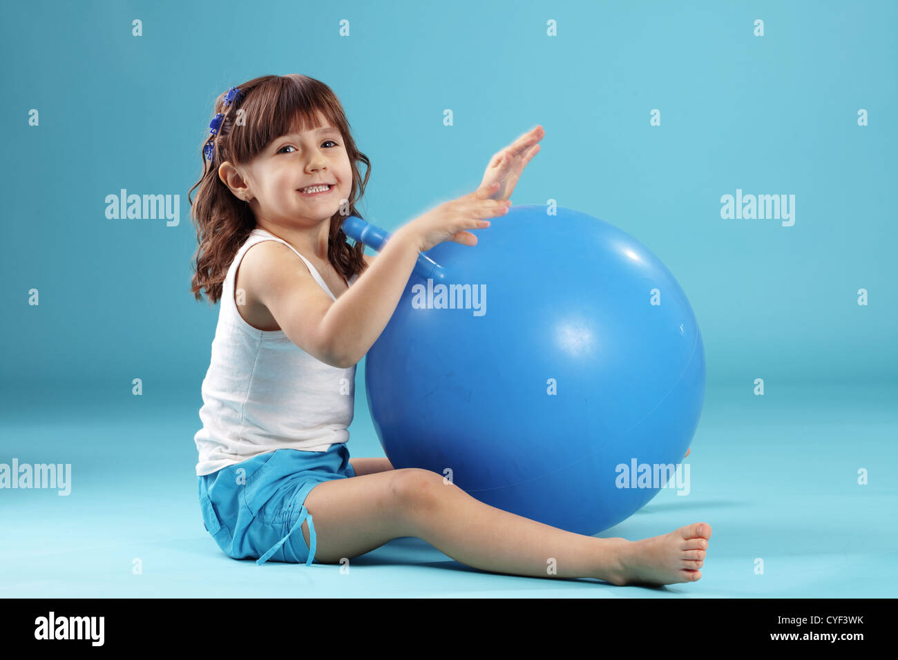 Child with gymnastic ball Stock Photo - Alamy