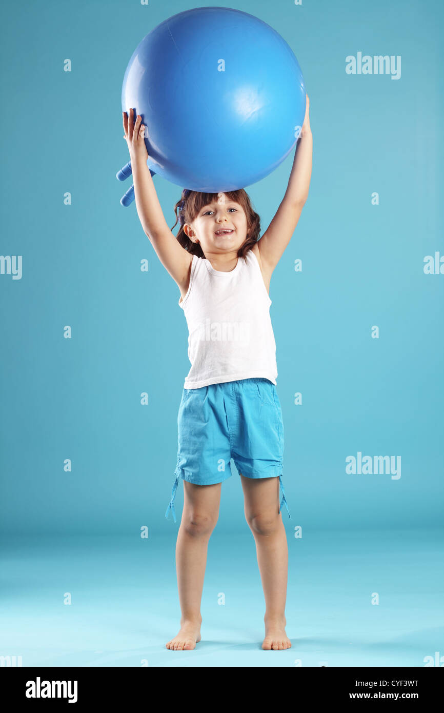 Child with gymnastic ball Stock Photo - Alamy