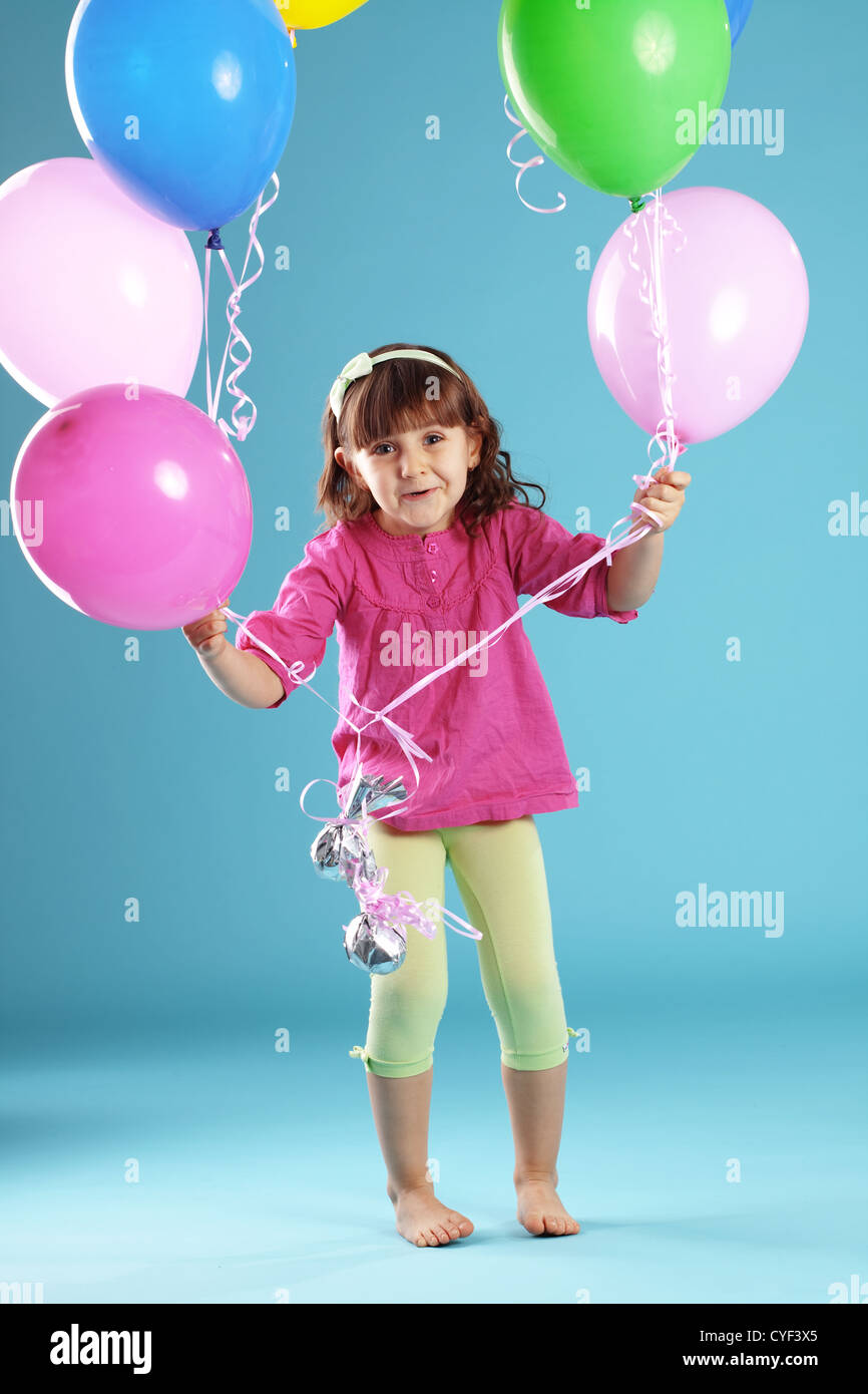Child with balloons Stock Photo - Alamy