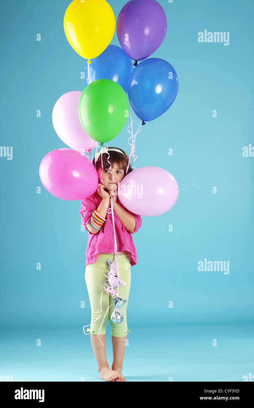 Child with balloons Stock Photo - Alamy