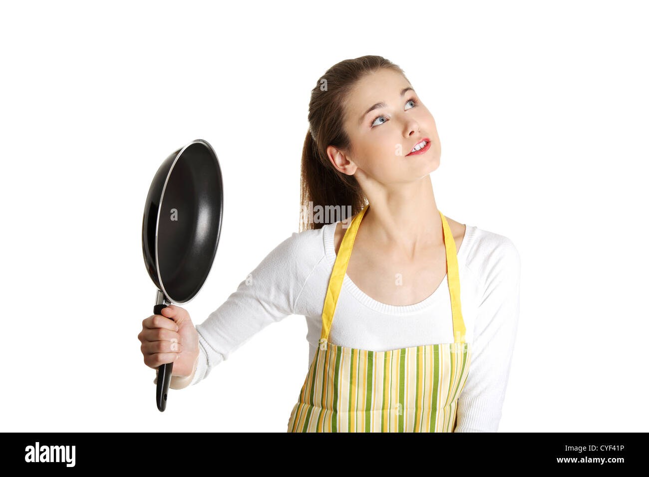 Female teen with a frying pan Stock Photo - Alamy