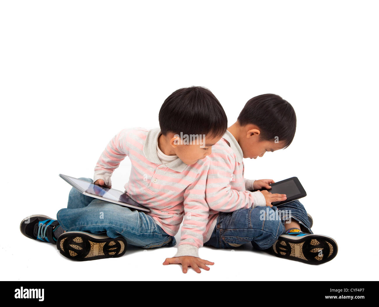 kids using tablet PC and isolated on white Stock Photo - Alamy