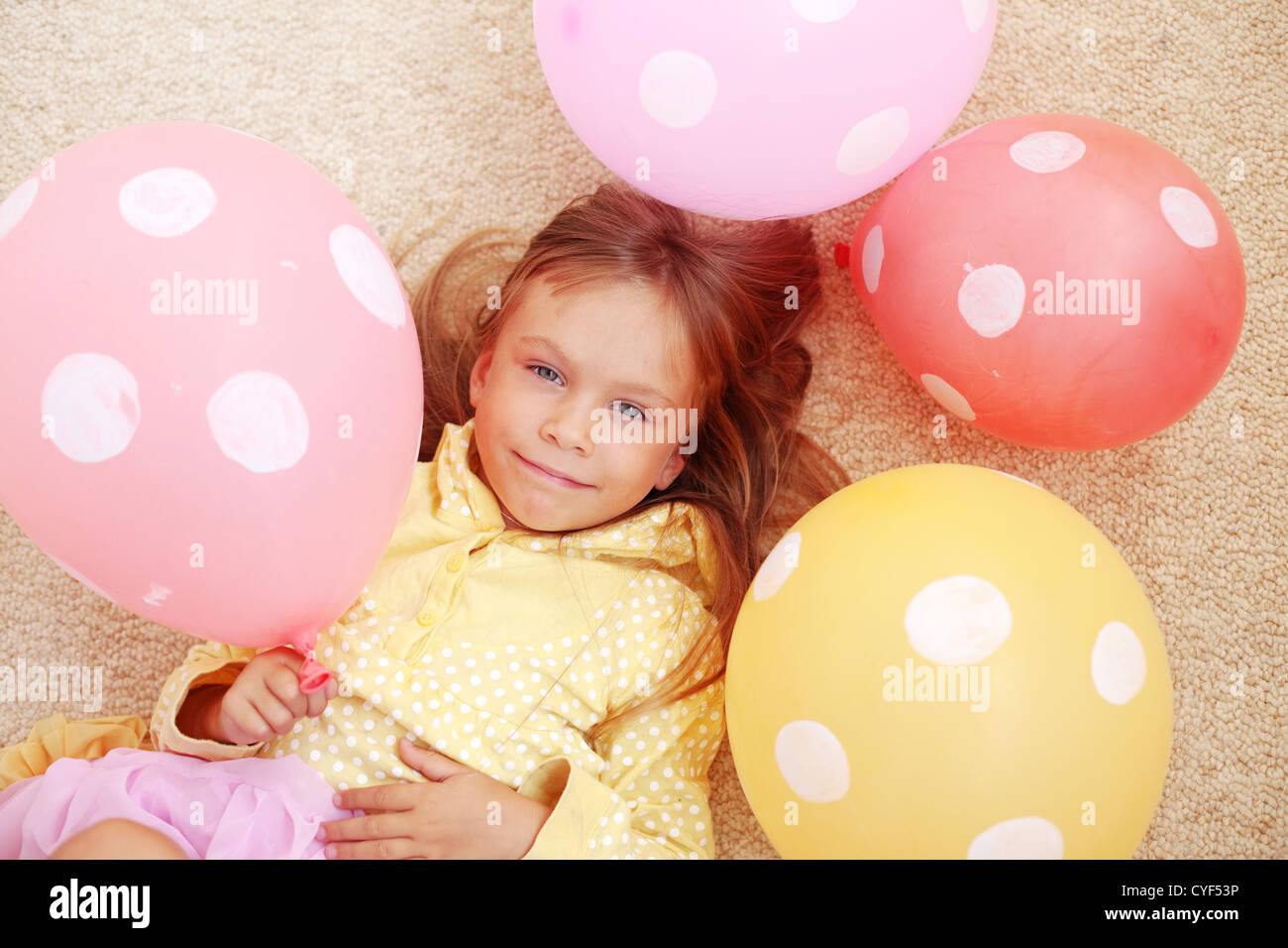 Child with air balloons Stock Photo - Alamy