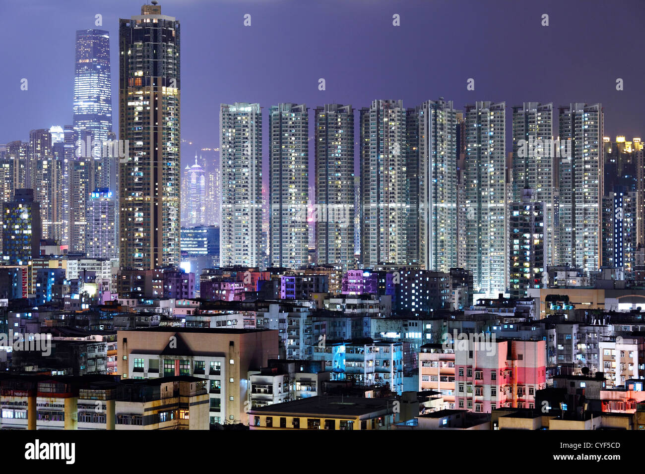 crowded building at night in Hong Kong Stock Photo - Alamy
