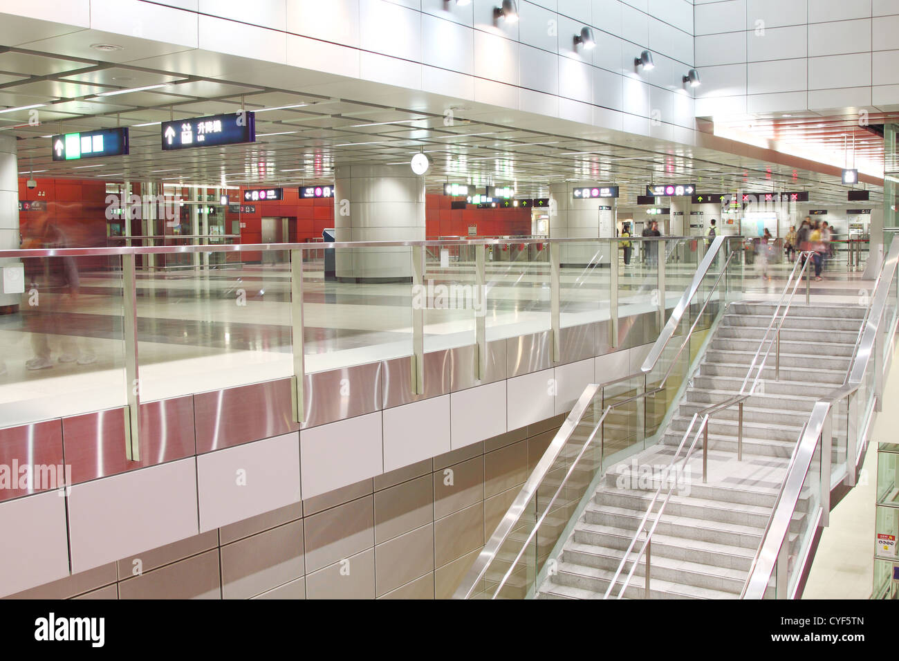 Moving people in train station during rush hours Stock Photo - Alamy