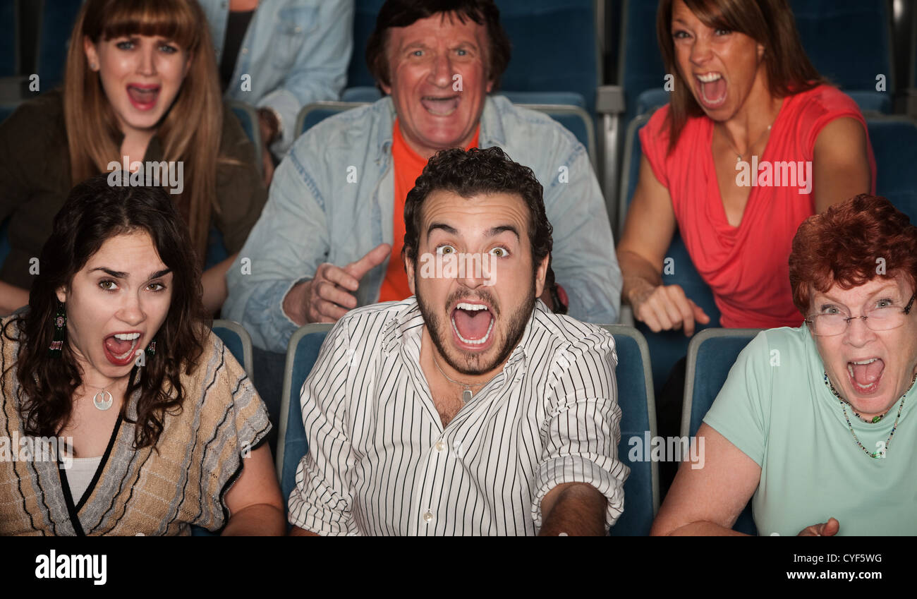 Group of scared people screaming in their seats Stock Photo - Alamy