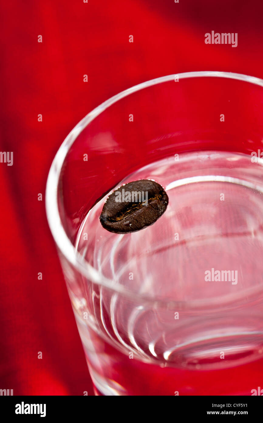 glass of sambuca with coffee beans Stock Photo - Alamy