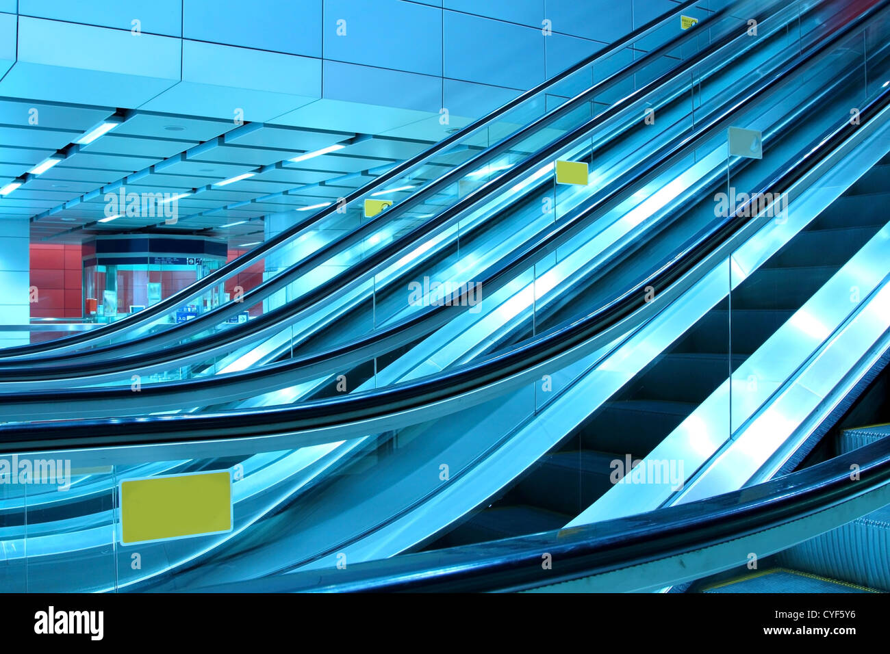 Moving escalator in modern interior, motion blurred Stock Photo - Alamy