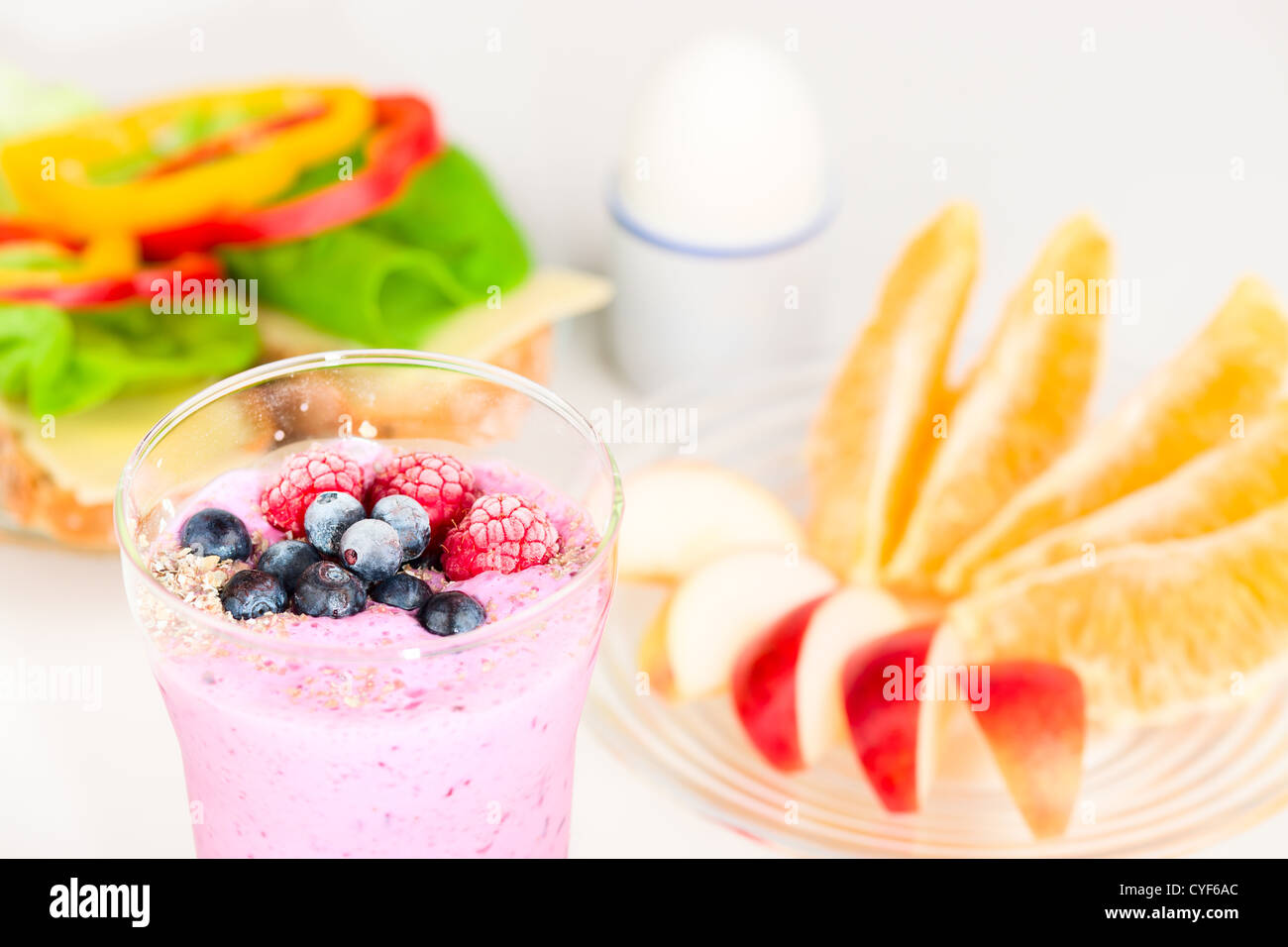 Healthy breakfast, white background and focus on berries Stock Photo ...