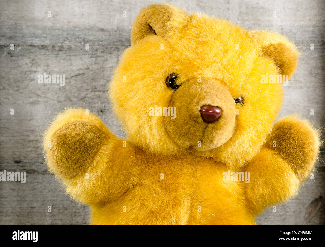 a teddy bear on wooden background Stock Photo - Alamy