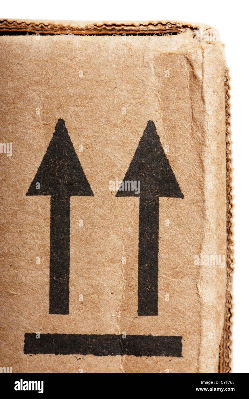 A sign with upward arrors on a cardboard box Stock Photo - Alamy