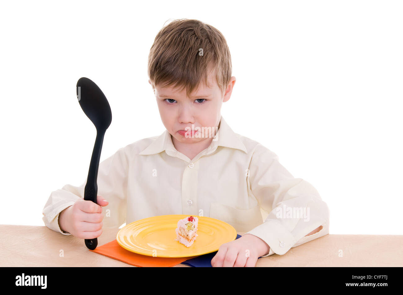 child with a large spoon isolated on white background Stock Photo - Alamy