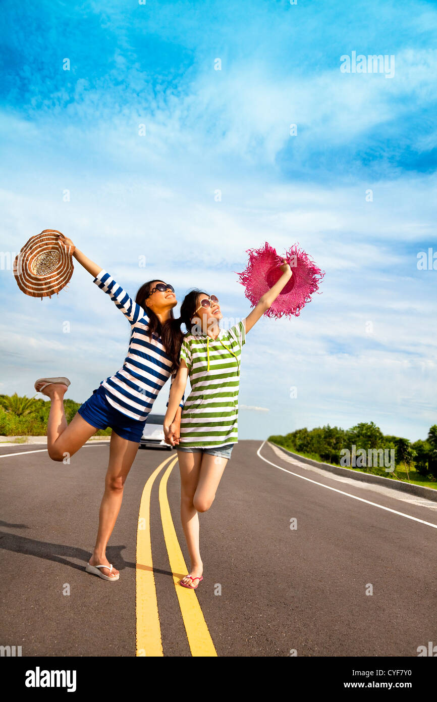 two girls having fun on the road trip at summertime Stock Photo - Alamy