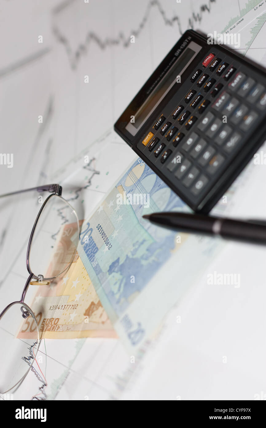 Interest focus on money and glasses Stock Photo - Alamy