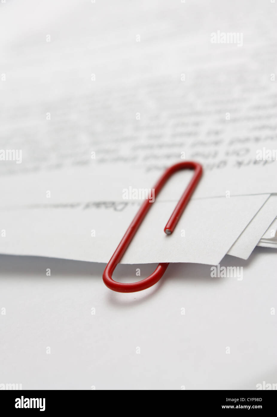 The clip on heap of paper Stock Photo - Alamy