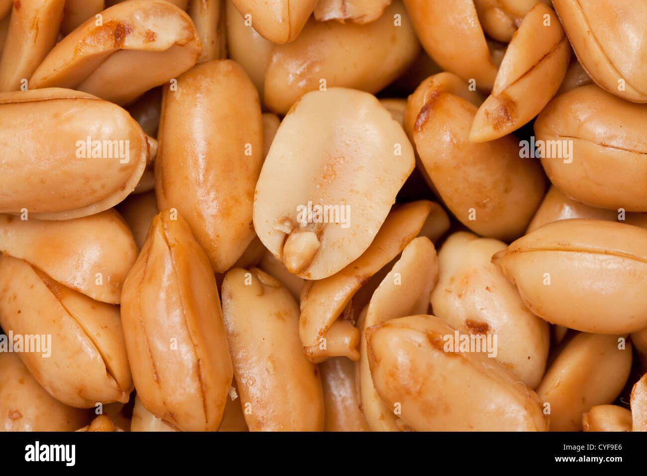 Fried peanuts background Stock Photo - Alamy