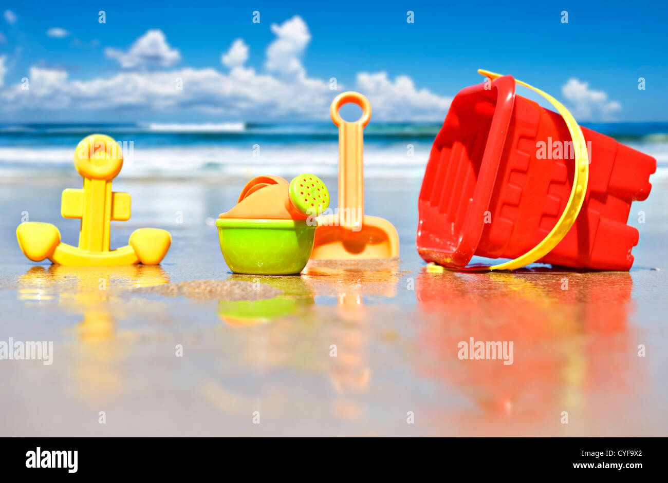 Closeup of children's beach toys at the beach Stock Photo - Alamy