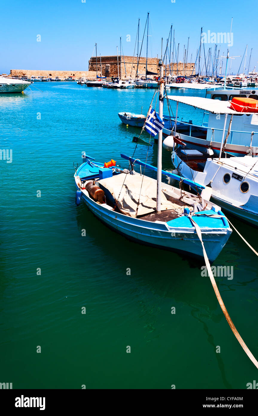 Boat on old fortress background Crete Greece Stock Photo - Alamy