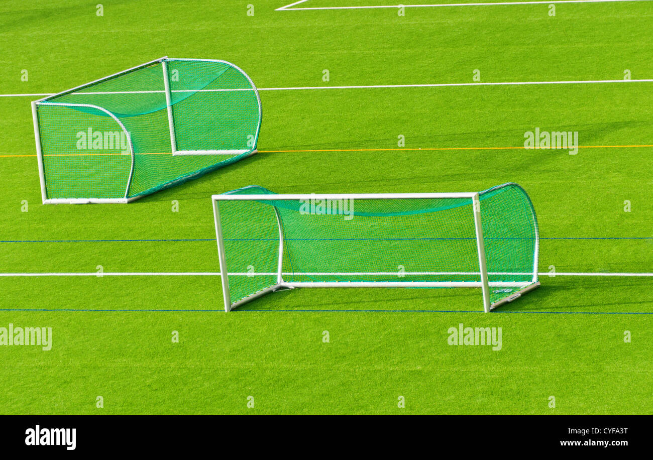 Football goals next to each other on football field Stock Photo - Alamy