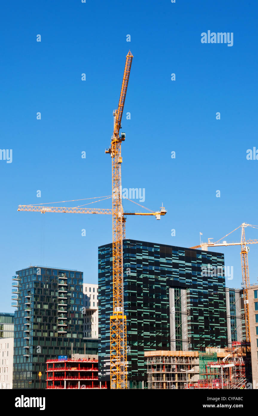 Building of buildings with two tower cranes Stock Photo - Alamy