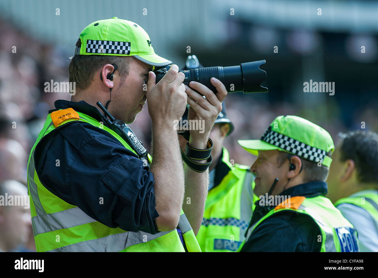 Police crowd surveillance at a British sporting event Stock Photo - Alamy