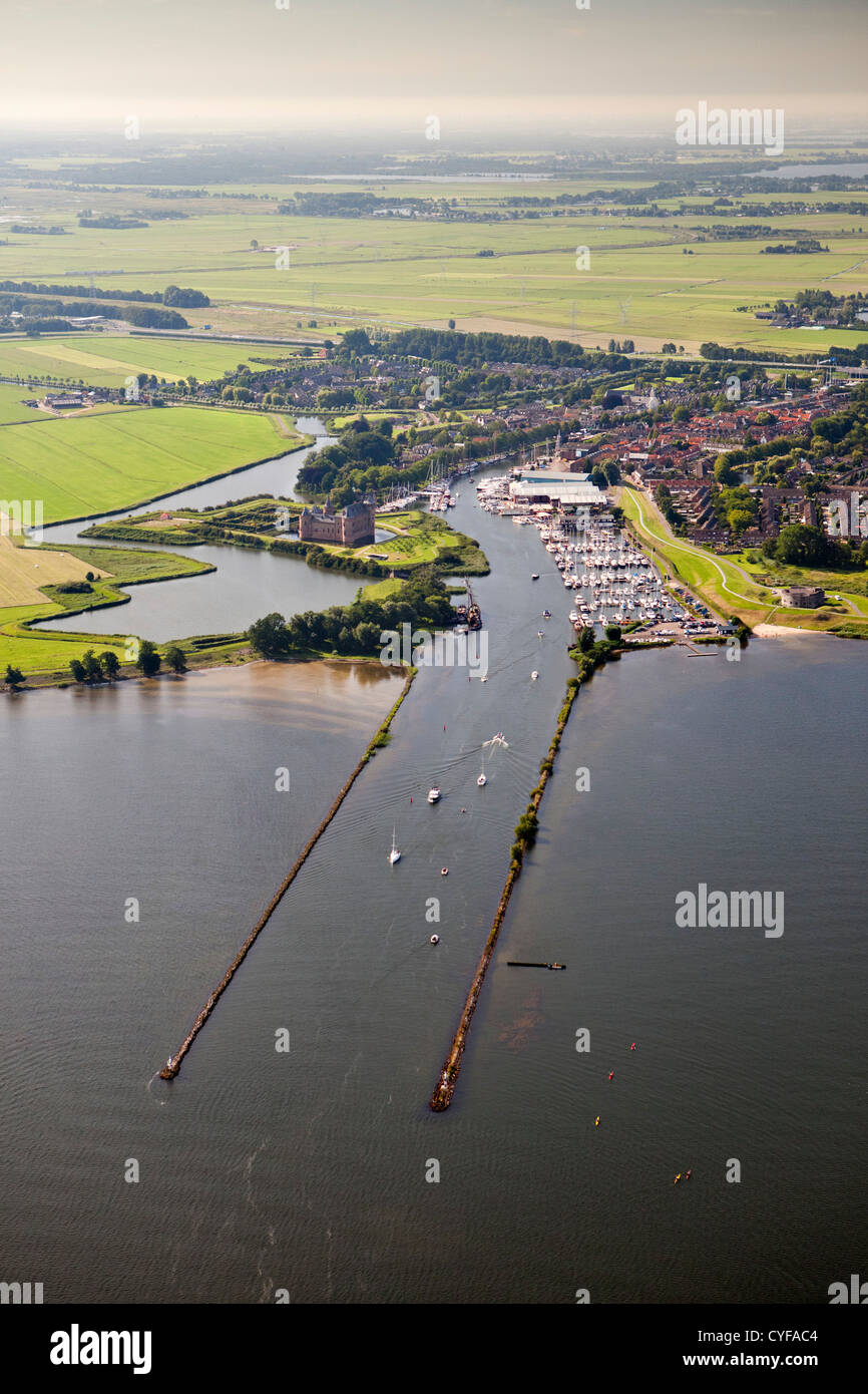The Netherlands, Muiden. Castle called Muiderslot. Marina and estuary ...