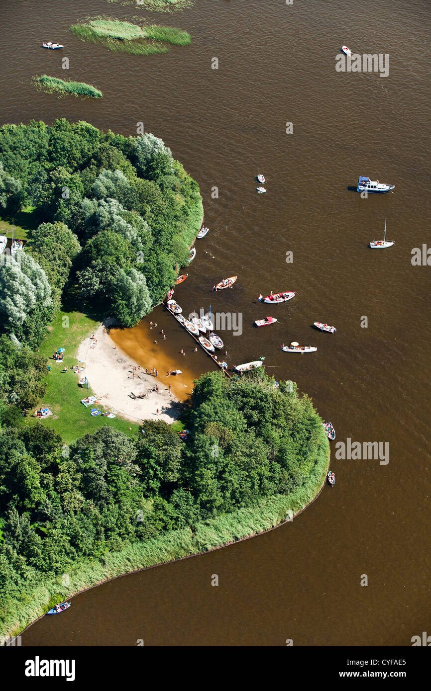 The Netherlands, Loosdrecht, Sailing boats and motor yachts anchored ...