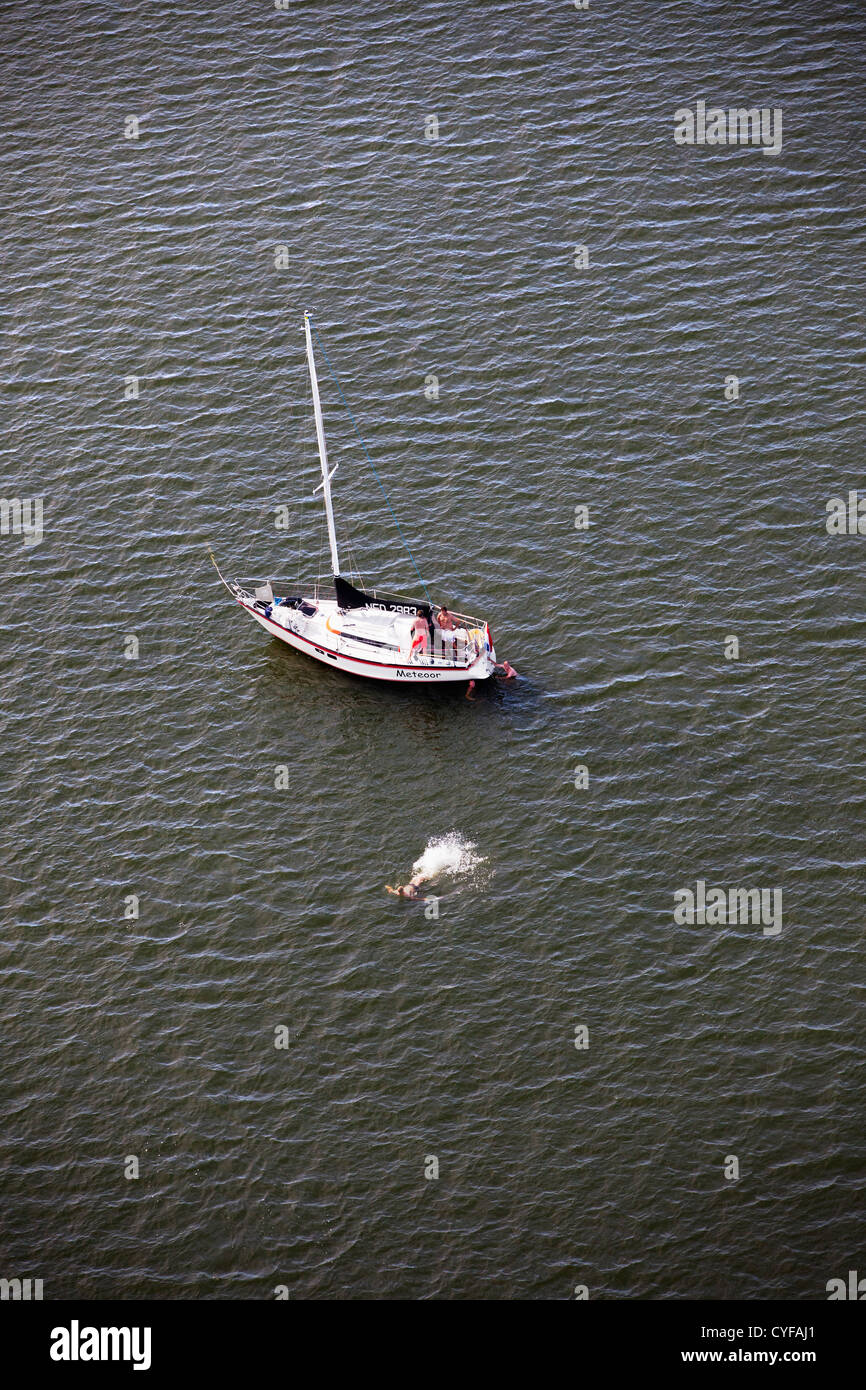 The Netherlands, Muiden. Swimming in lake called IJmeer. Aerial Stock ...